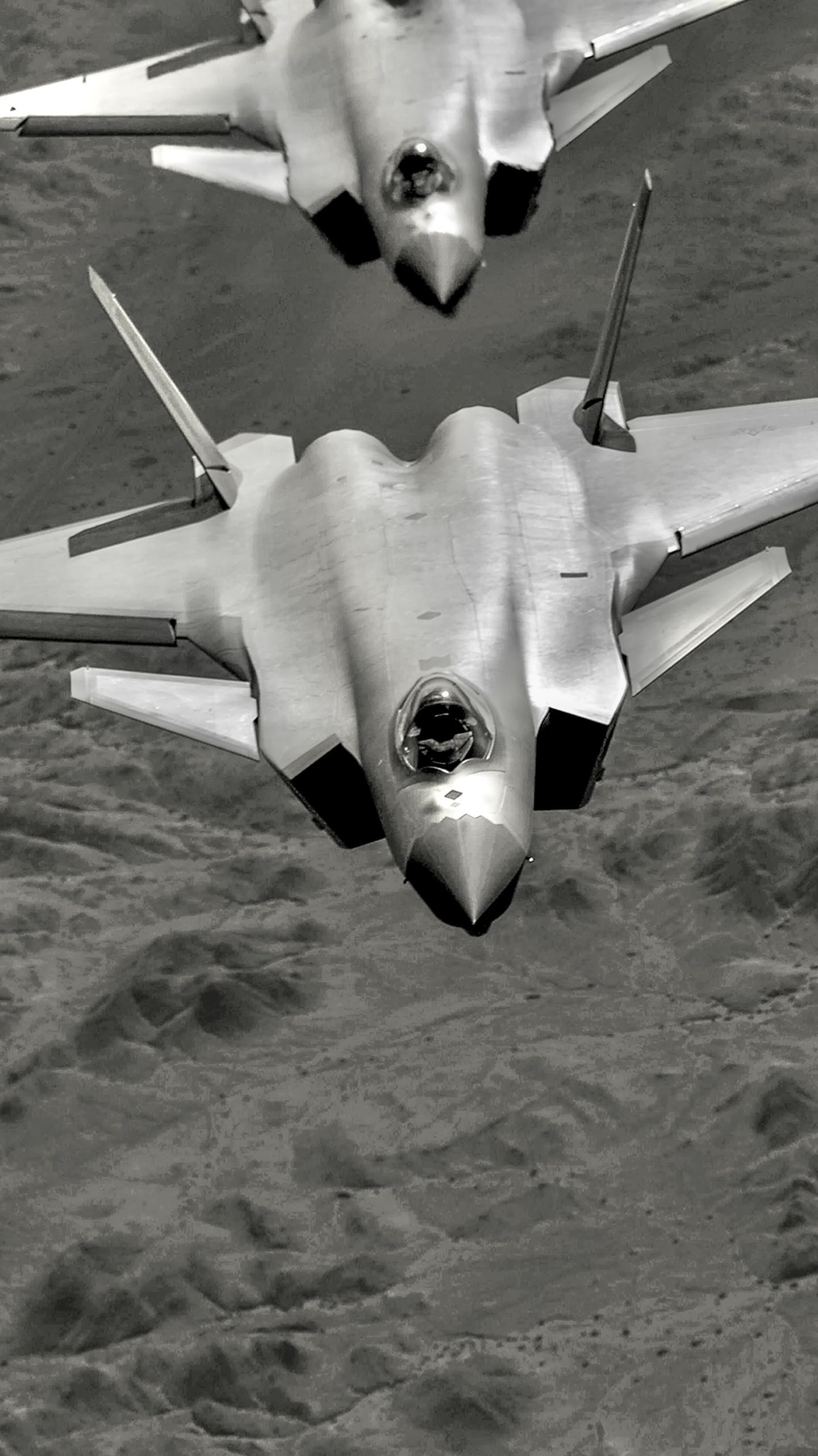 Pictures of J-20s flying over Tiananmen Square released